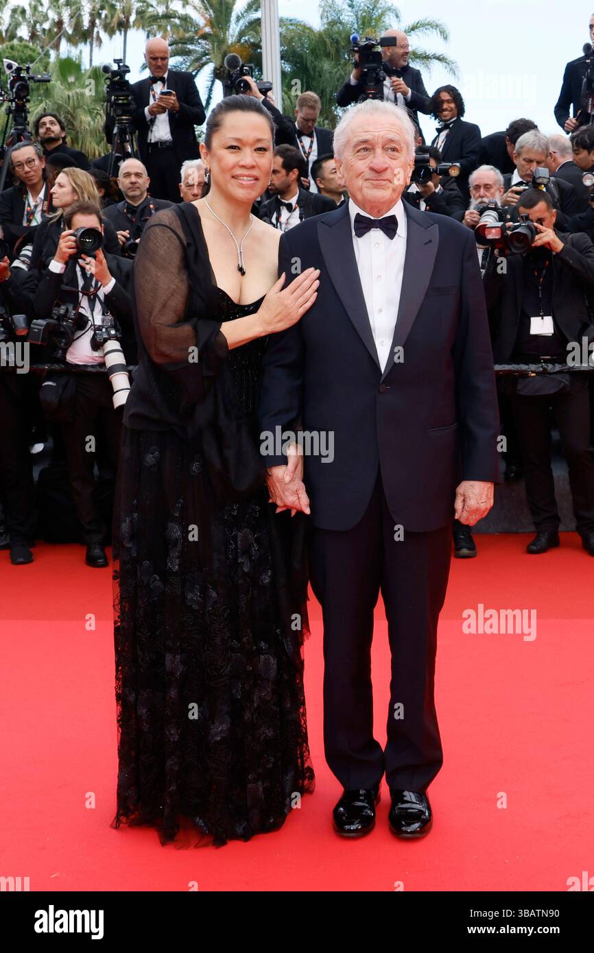 Tiffany Chen, left, and Robert De Niro pose for photographers during the opening ceremony red ...