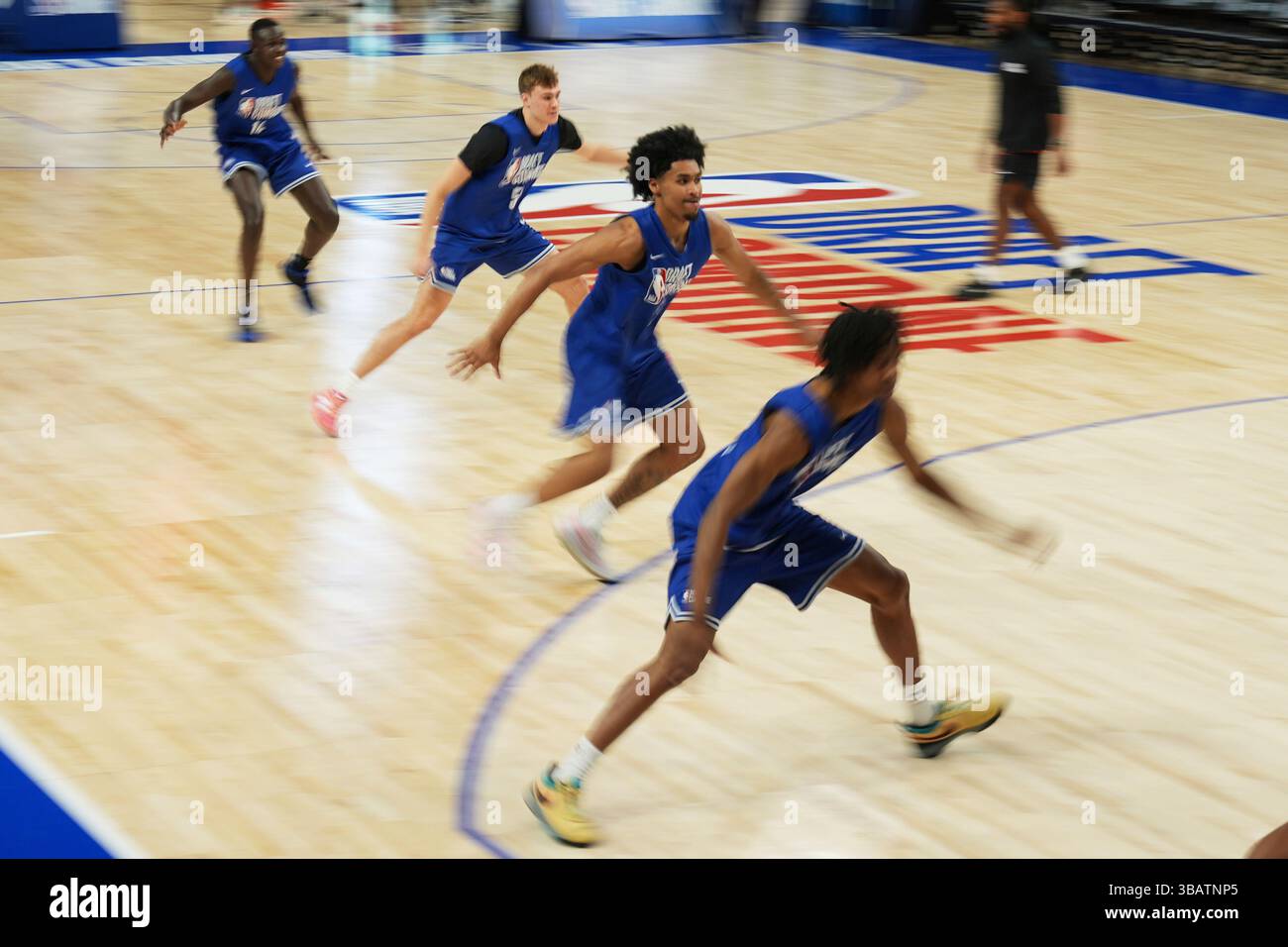 Khaman Maluach, from rear left, and Cooper Flagg, Dylan Harper and Tre Johnson participate in ...