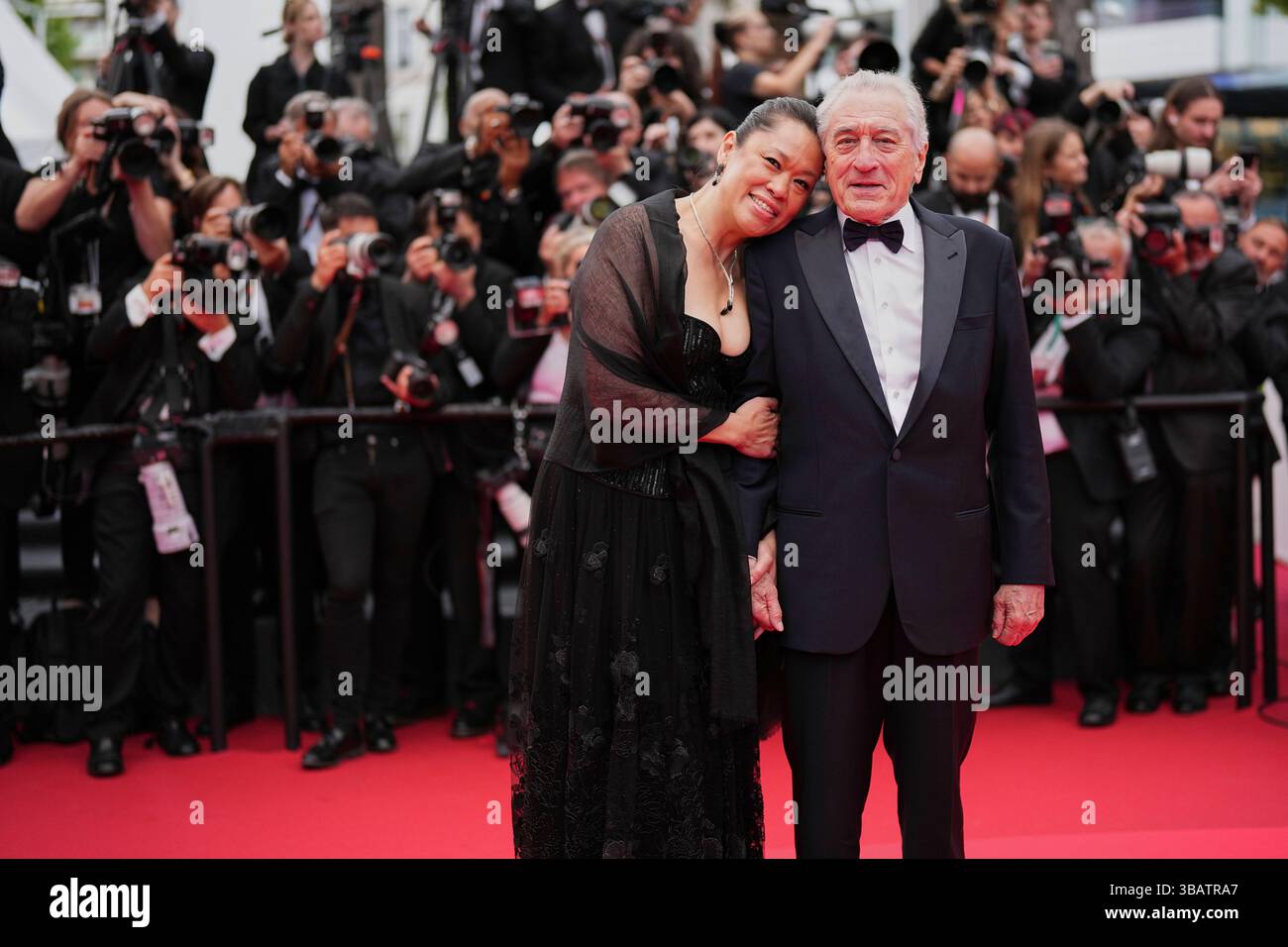 Tiffany Chen, left, and Robert De Niro pose for photographers during ...