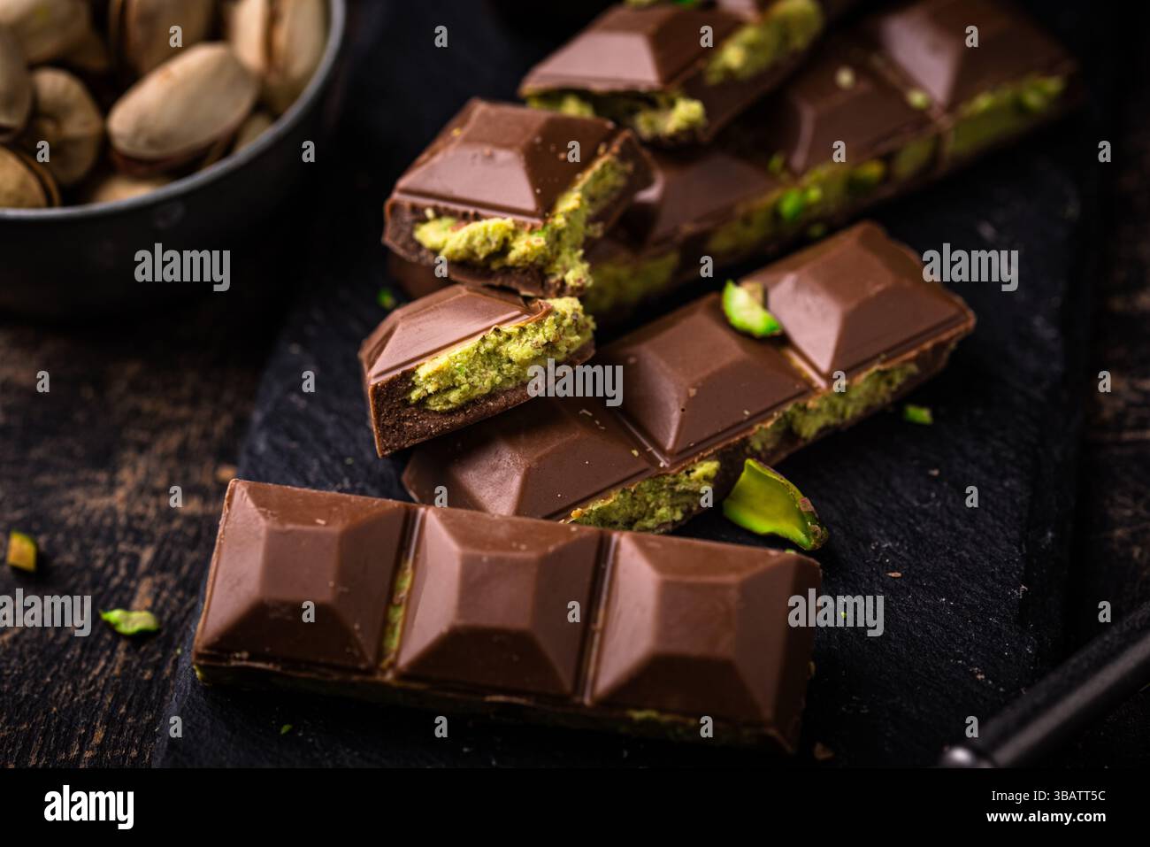 Dubai chocolate with kadayif pistachio filling Stock Photo - Alamy