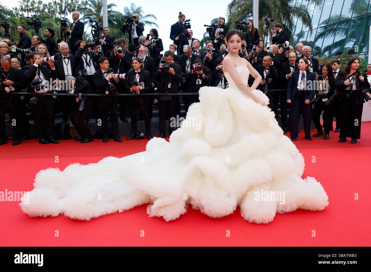 Wan QianHui poses for photographers during the opening ceremony red ...