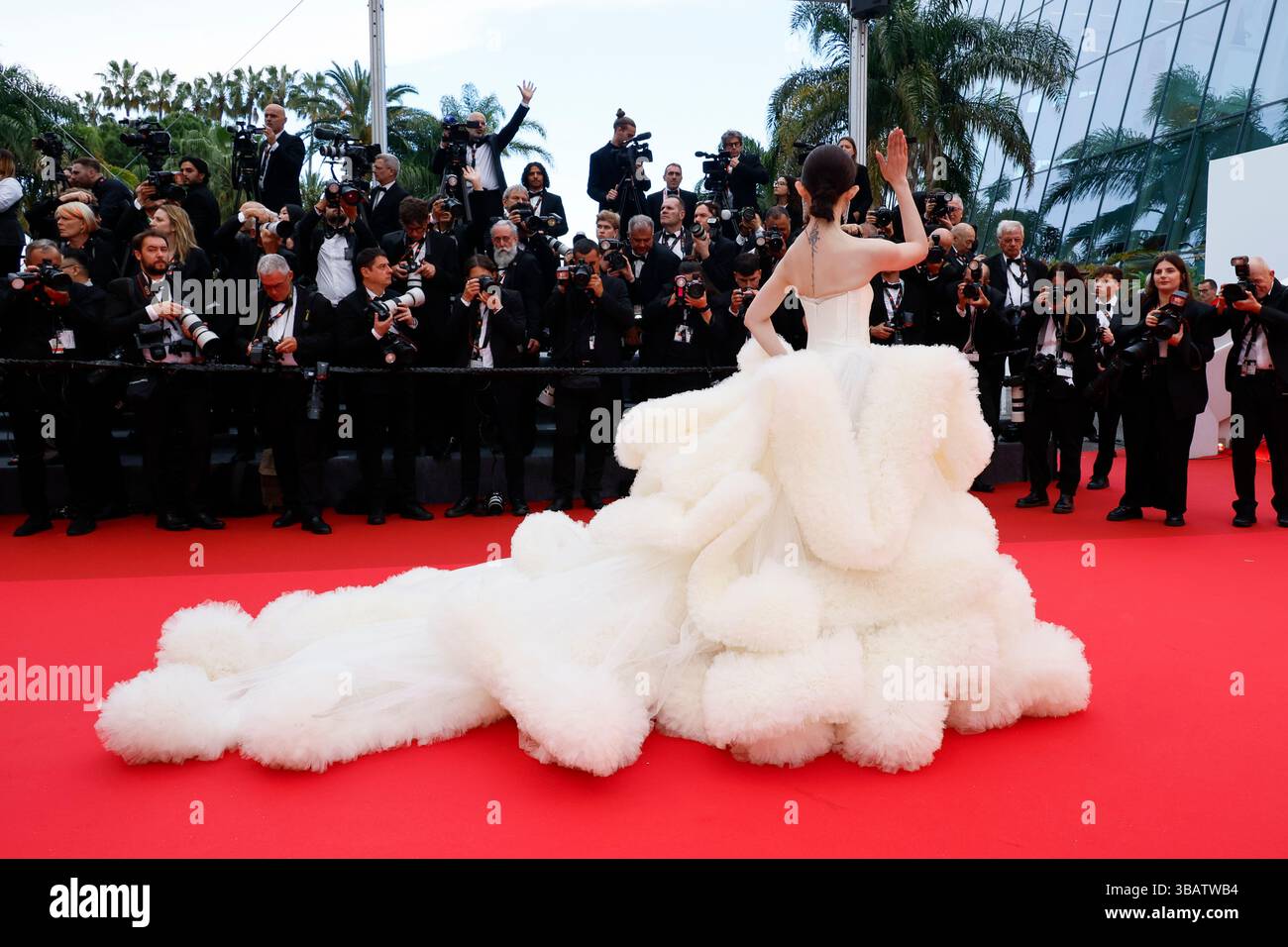 Wan QianHui poses for photographers during the opening ceremony red ...