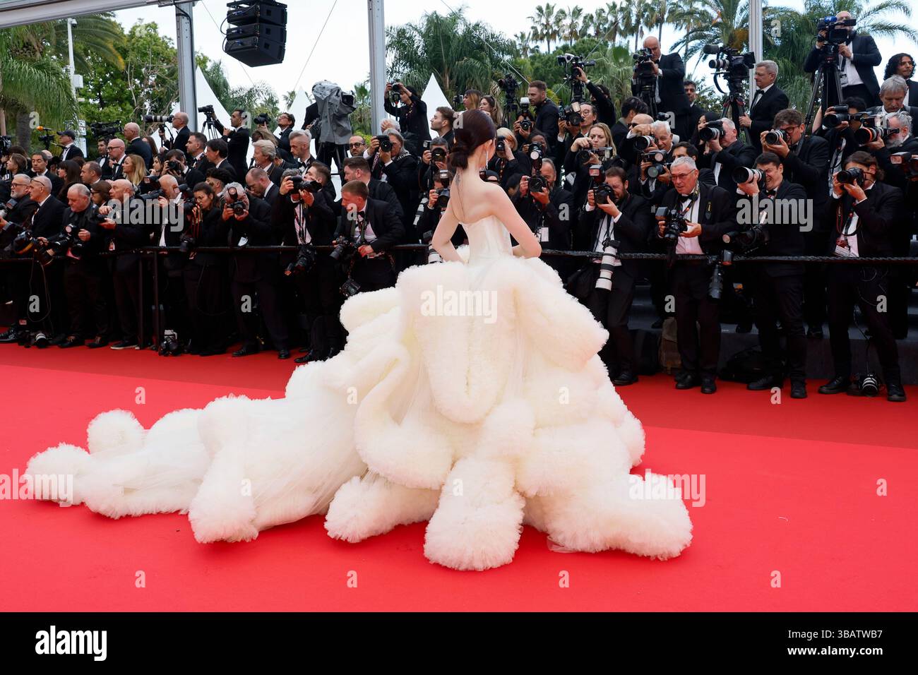 Wan QianHui poses for photographers during the opening ceremony red ...