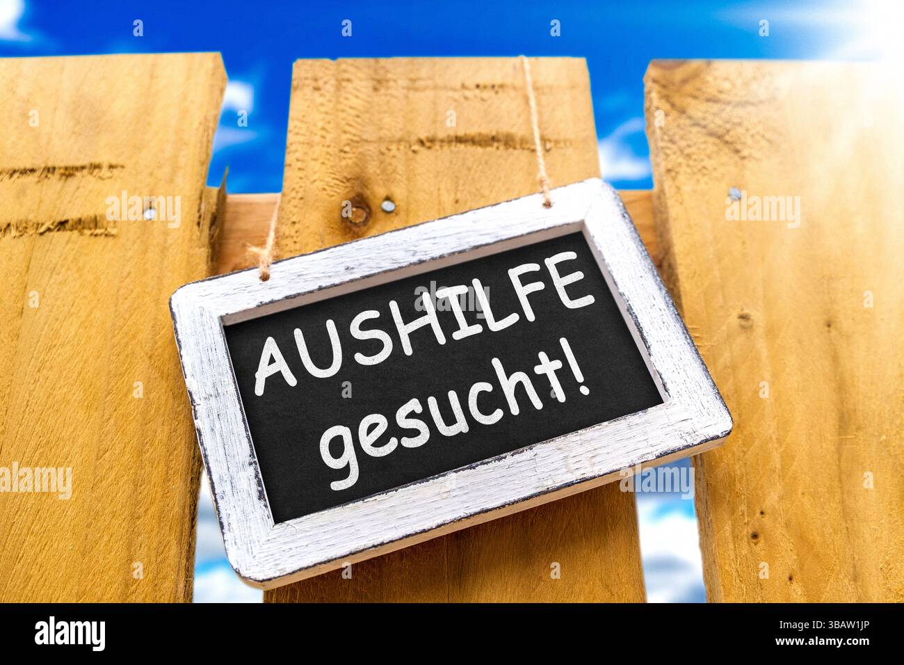 Germany - May 13, 2025: PHOTOMONTAGE, sign on a fence with the ...