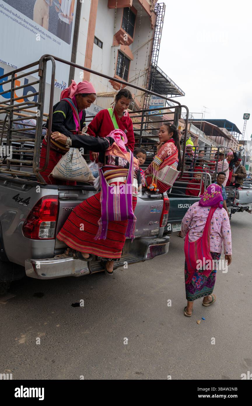 An open truck filled with Burmese villagers accompanied with their ...