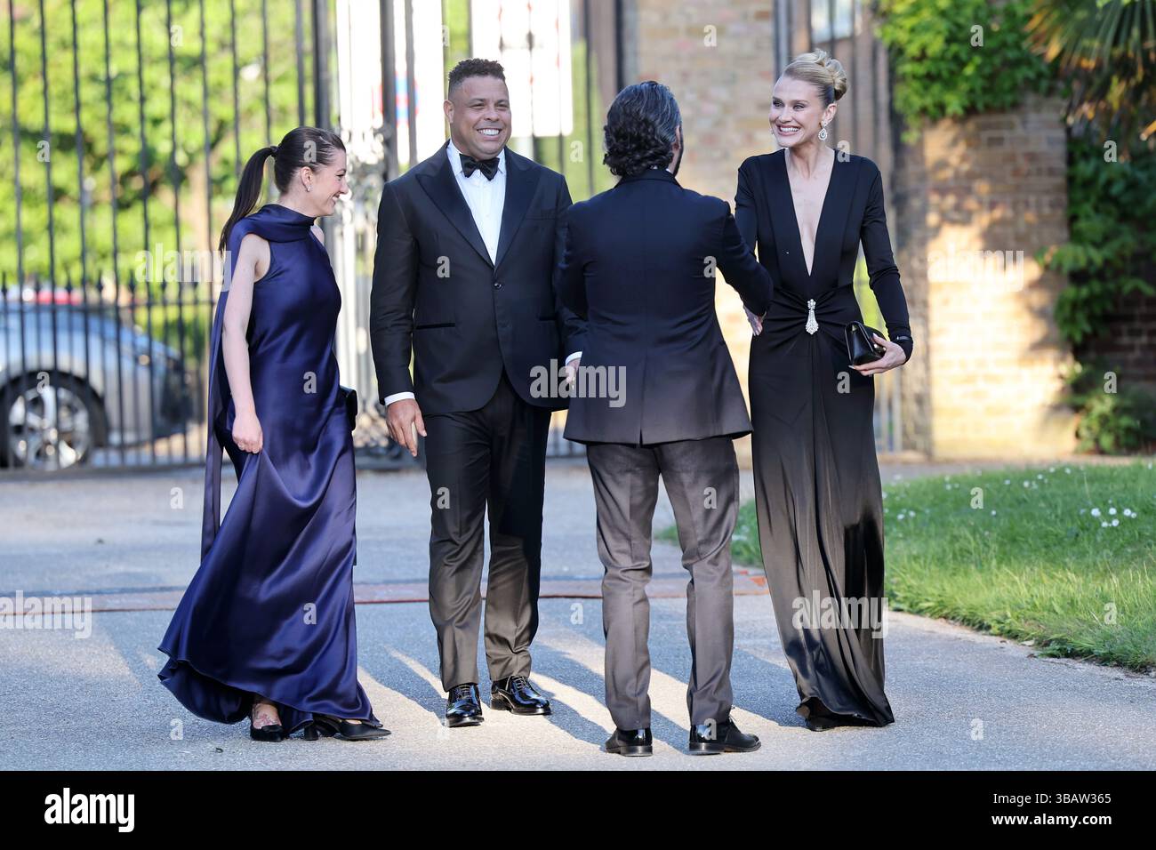 Ronaldo Nazario (second left) and Celina Locks (right) attend the ...