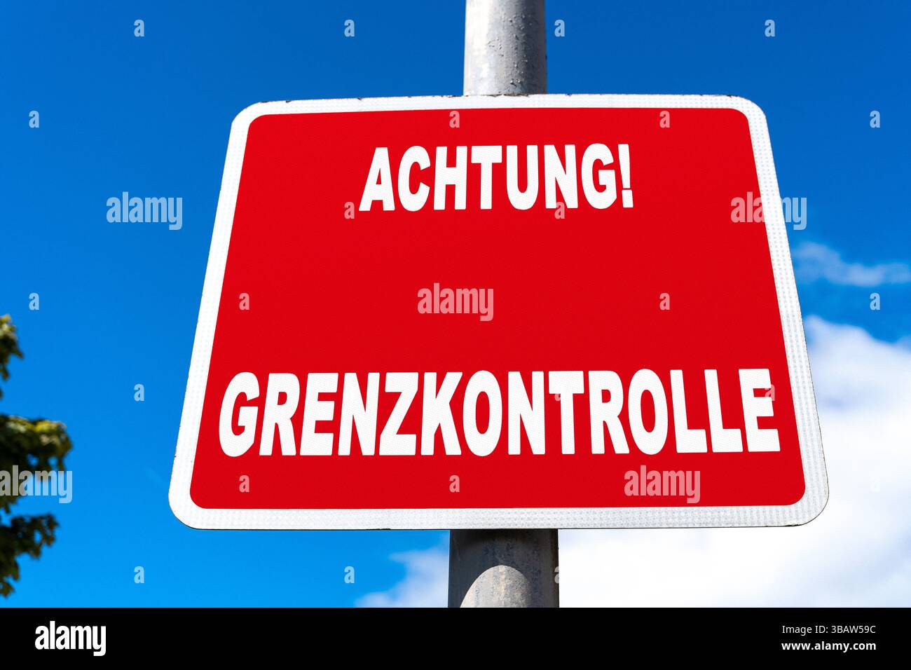 Germany - May 13, 2025: PHOTOMONTAGE, red sign with the inscription ...