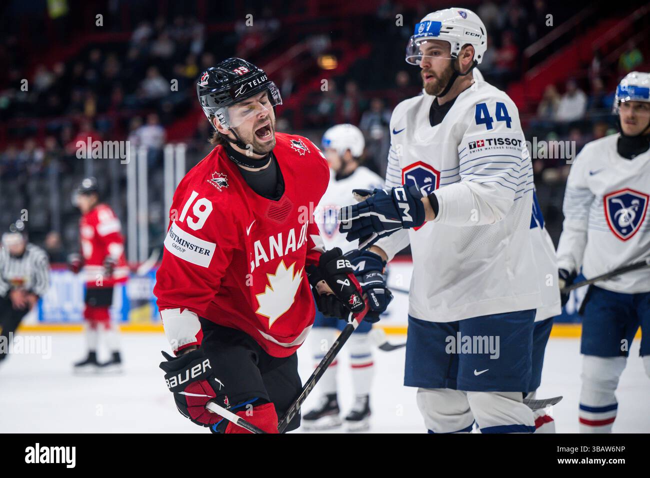 Adam Fantilli of, Canada. , . and Kevin Spinozzi of France during the 2025 IIHF Ice Hockey World ...