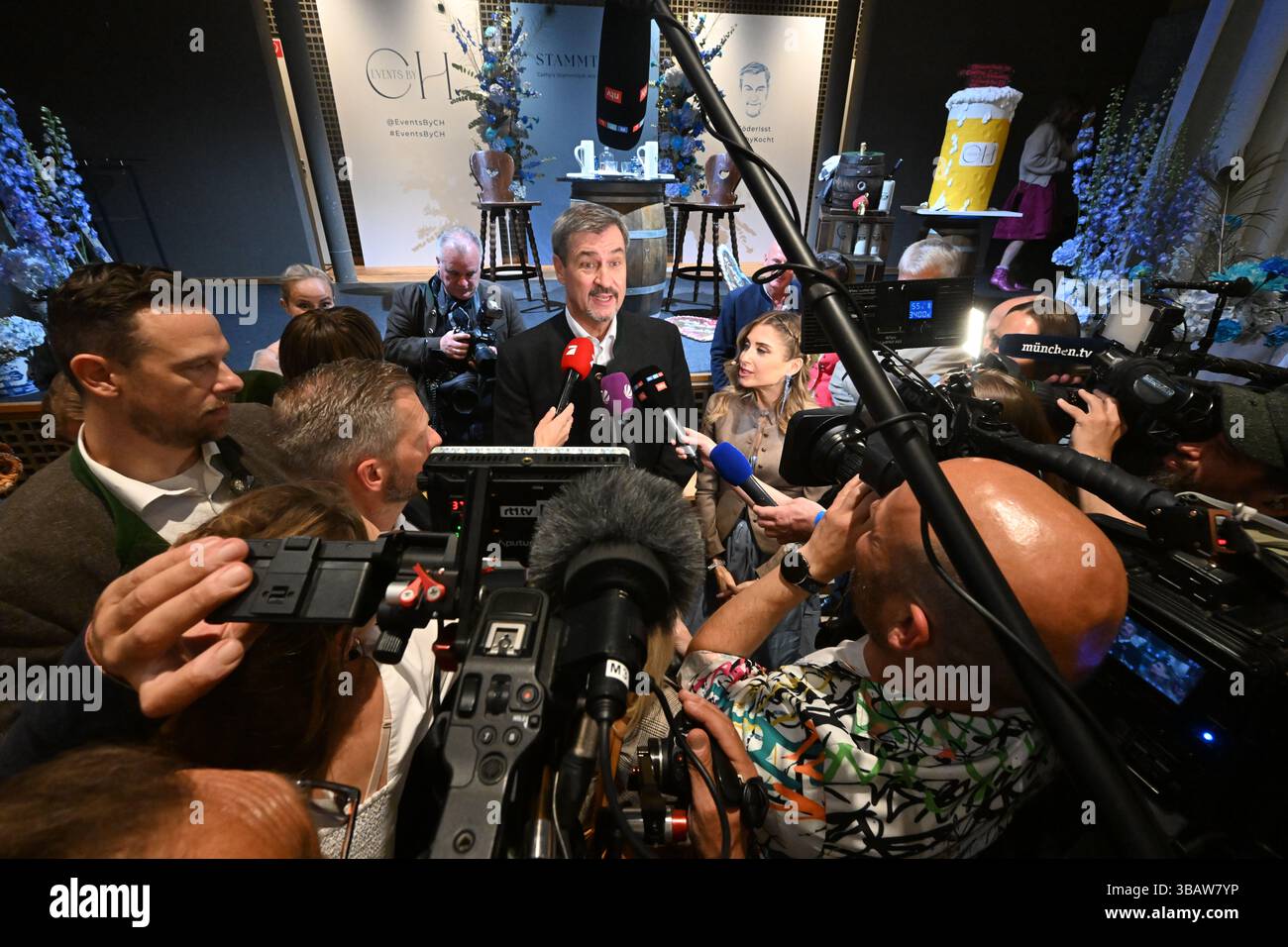 Munich, Germany. 13th May, 2025. Influencer Cathy Hummels (center ...