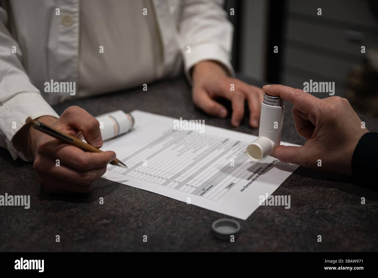 Berlin, Germany. 09th May, 2025. A person holds an inhaler while a ...