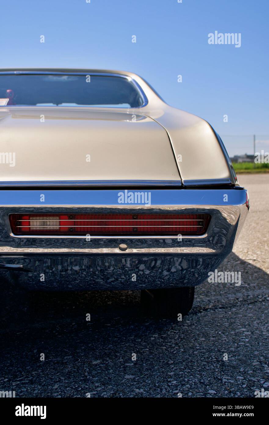 Rear End Close-Up of a Classic American Muscle Car with Chrome Bumper ...