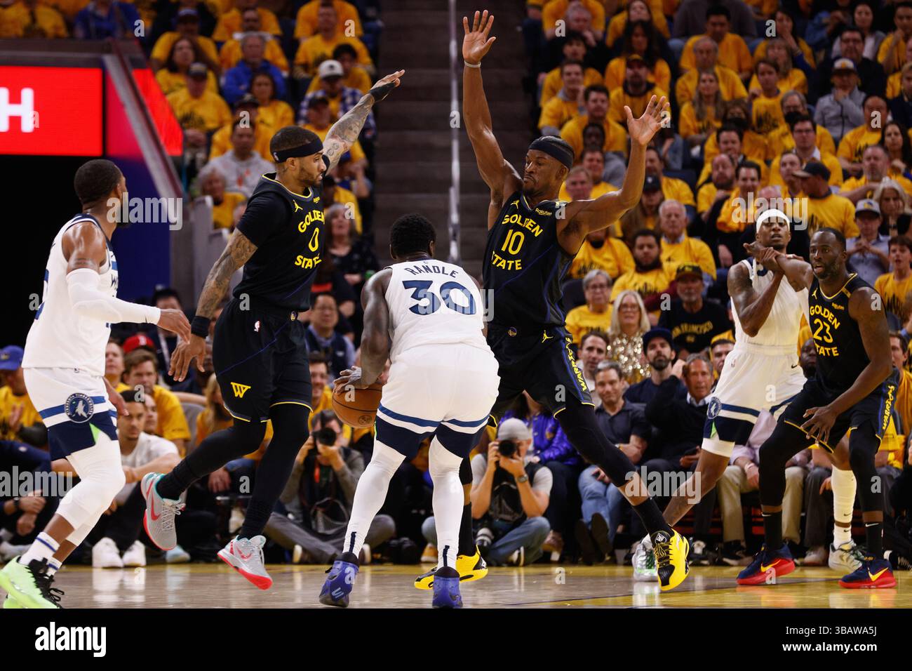 Minnesota Timberwolves forward Julius Randle (30) is double teamed by ...