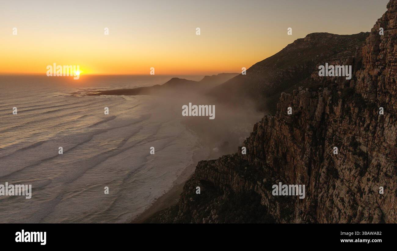 Misty Cliffs in Cape Town, South Africa The sun sets over the Atlantic ...