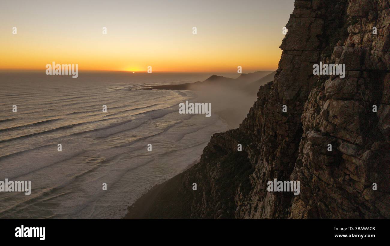 Misty Cliffs in Cape Town, South Africa The sun sets over the Atlantic ...