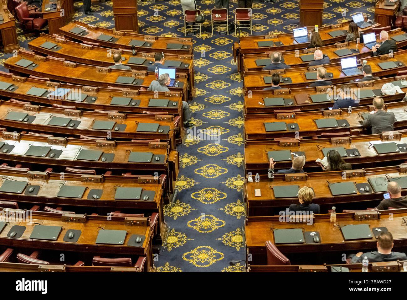 FILE - A few Democrats appear on the House floor for the swearing in of ...