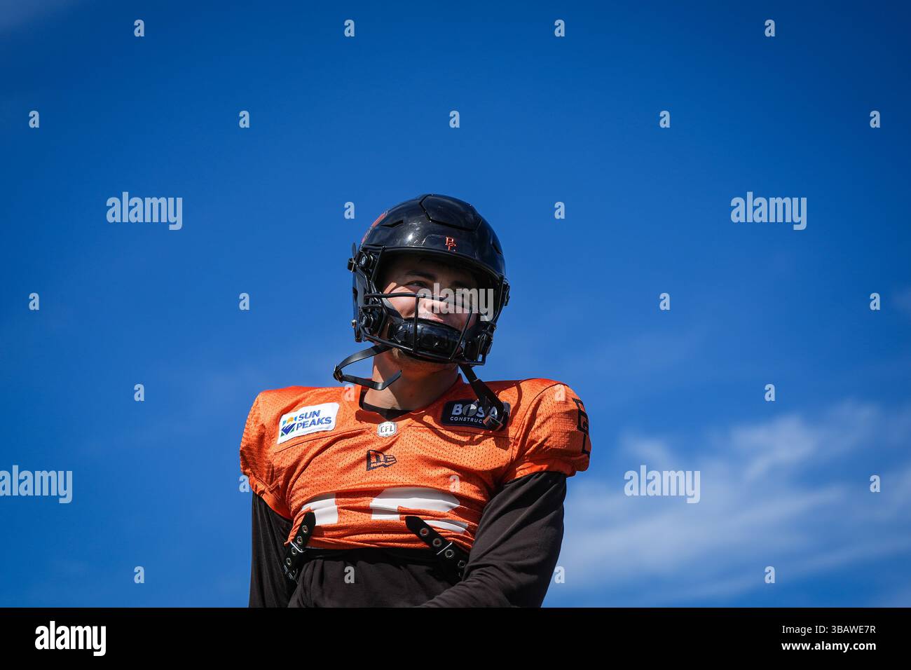 Kamloops, Canada. 13th May, 2025. B.C. Lions quarterback Nathan Rourke smiles while talking to a ...