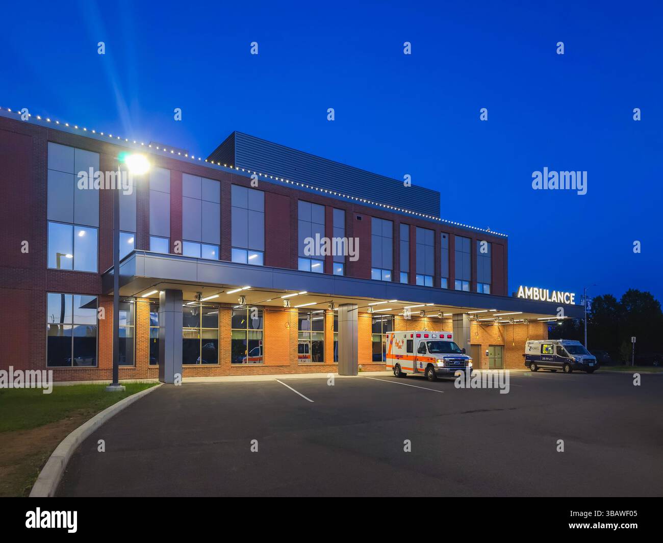 Utica, NY - Jun 11, 2024: Night view of the Ambulance building of Wynn ...