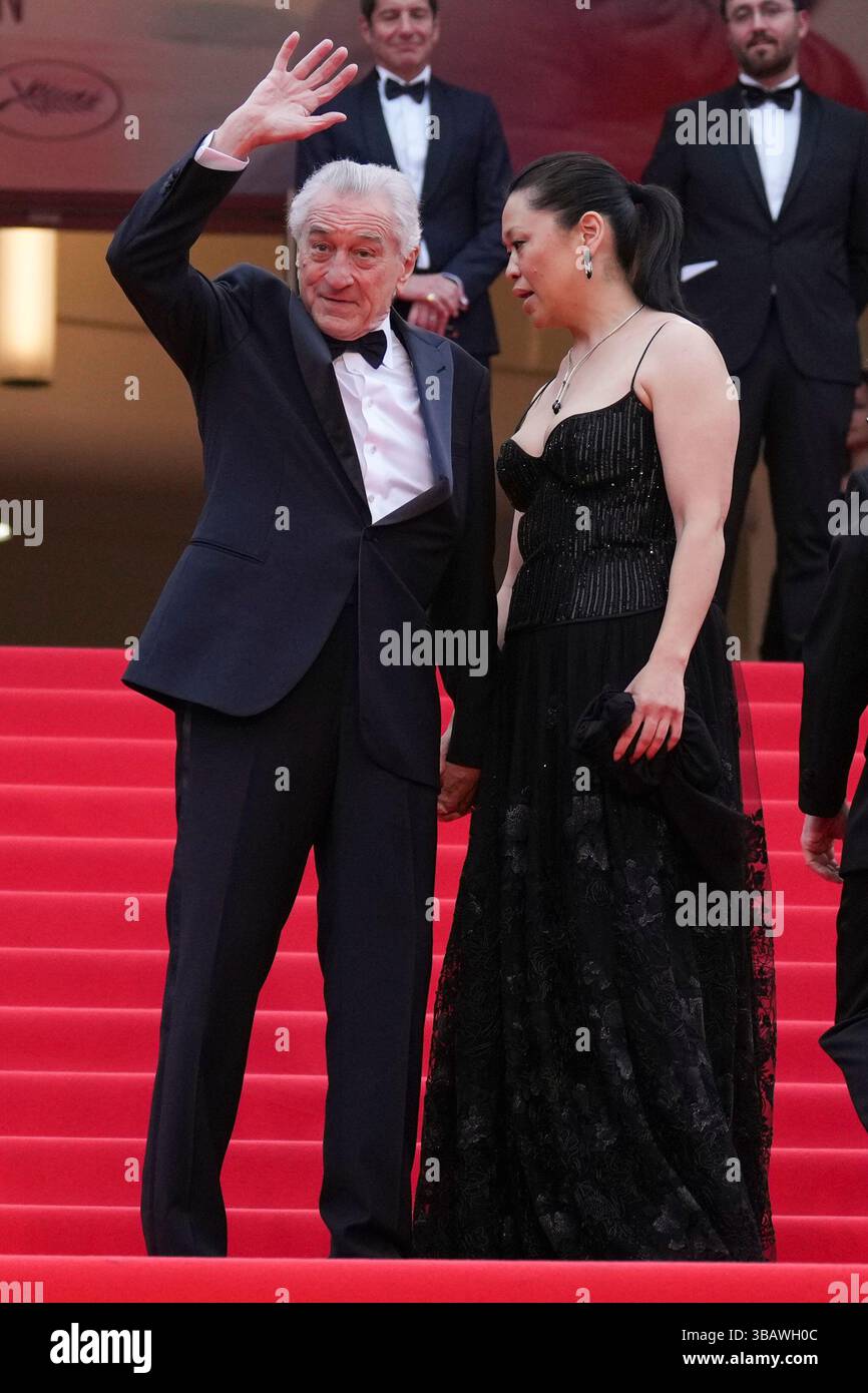Robert De Niro, left, and Tiffany Chen pose for photographers during ...