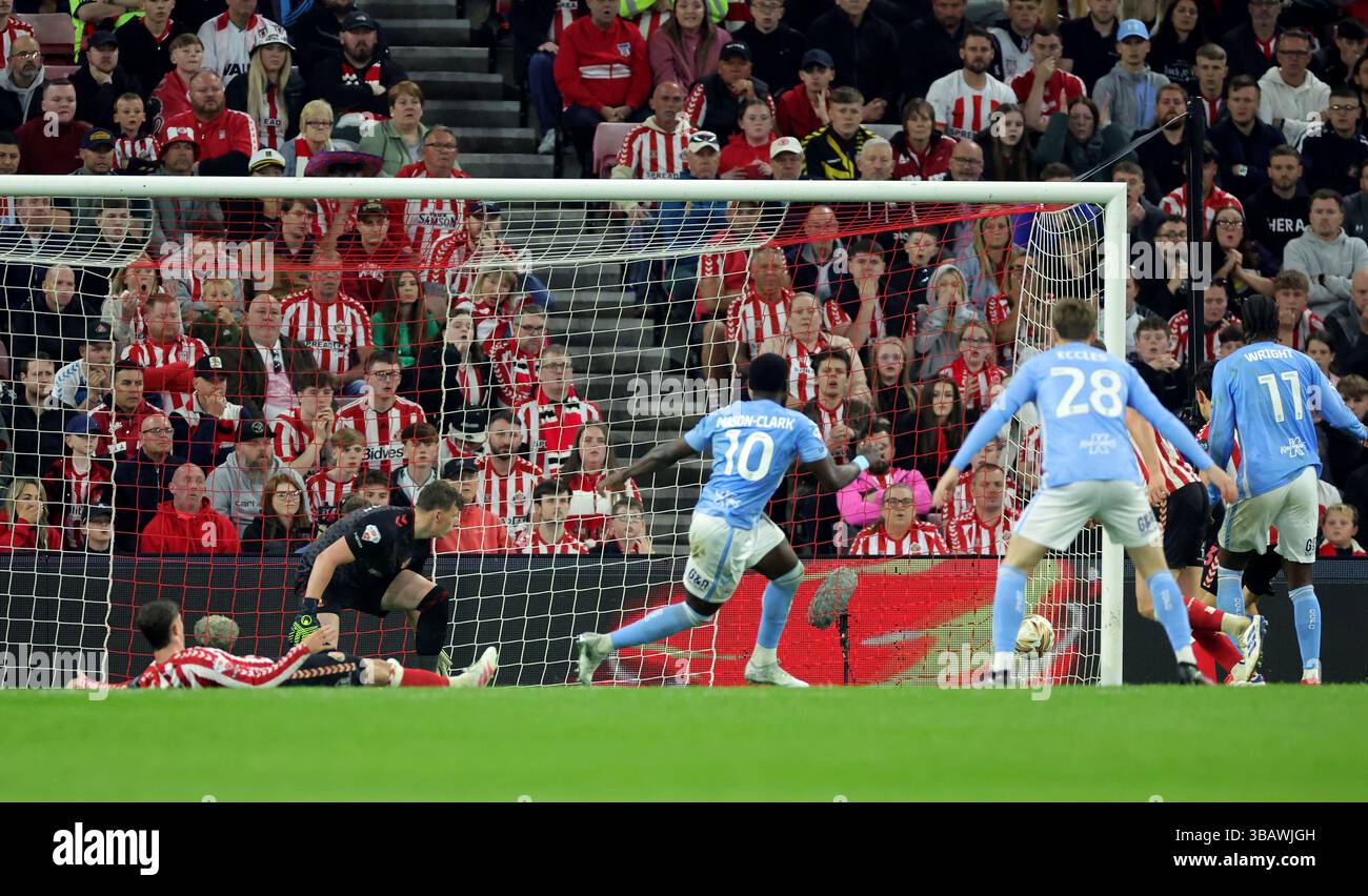 Coventry City's Ephron Mason-Clark scores their side's first goal of ...