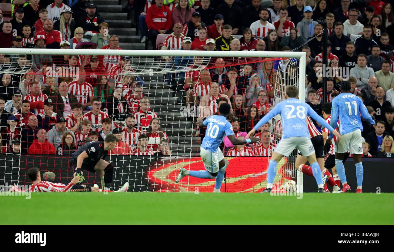 Coventry City's Ephron Mason-Clark scores their side's first goal of ...