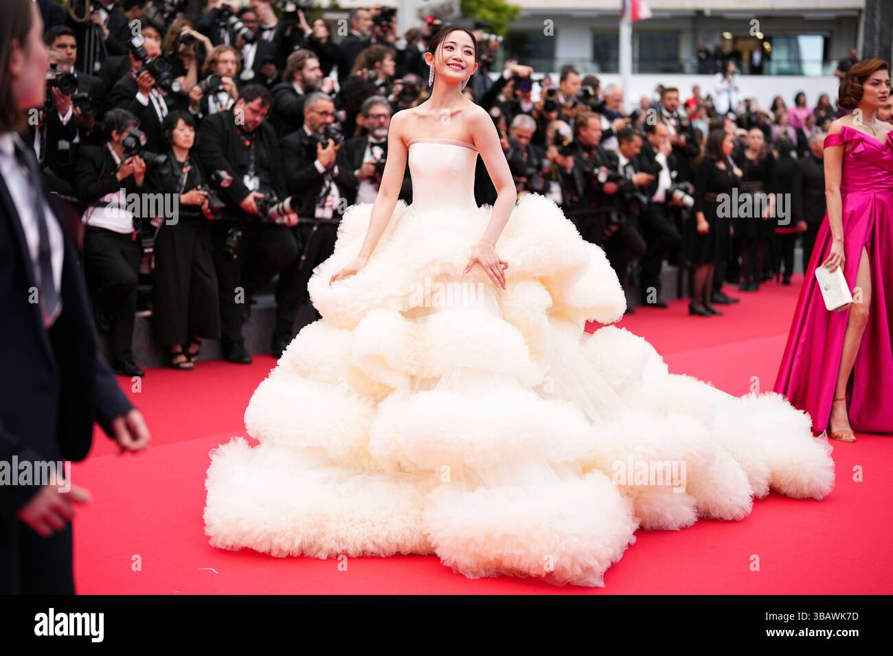 Wan QianHui poses for photographers during the opening ceremony of the 78th international film ...