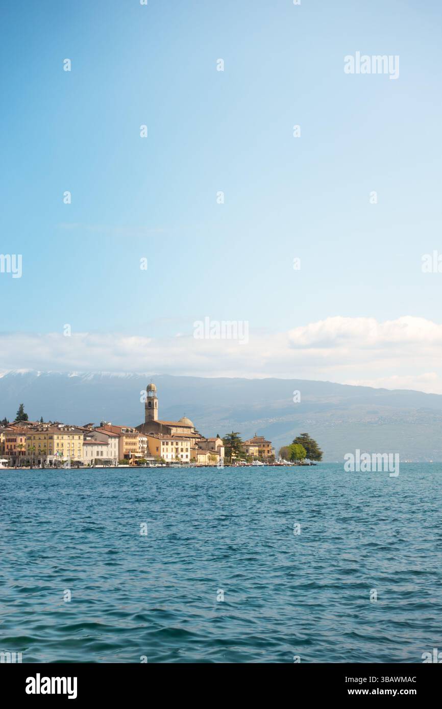 Panoramic view of coastal town Salò by Lago di Garda lake with iconic ...