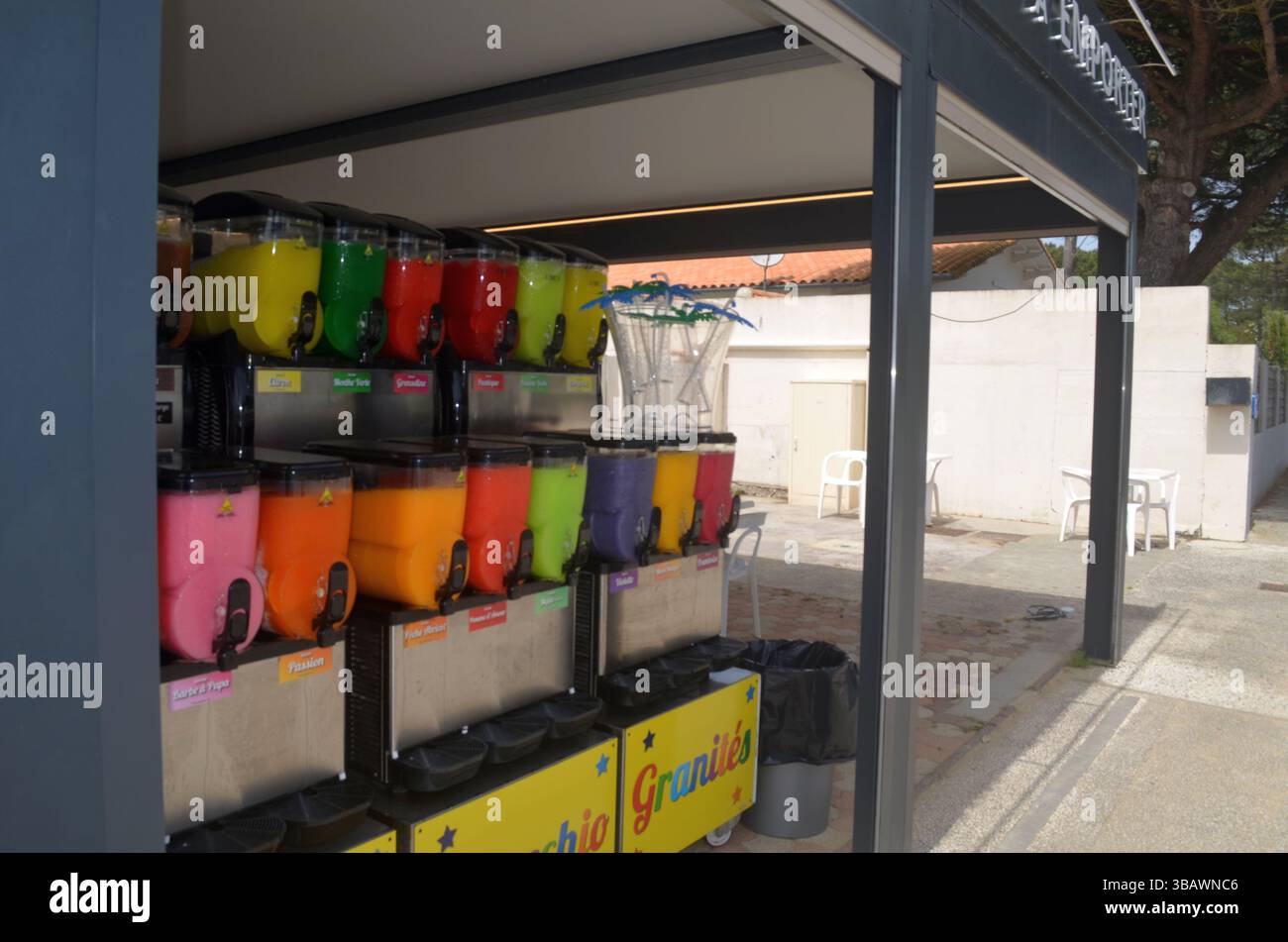 La Palmyre, France - May 01, 2025: Colorful slushie machine display at ...