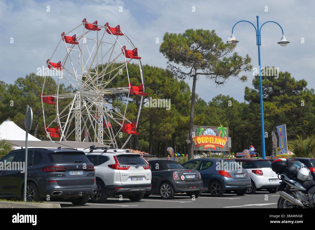 La Palmyre, France - May 01, 2025: Ferris wheel stands tall in ...