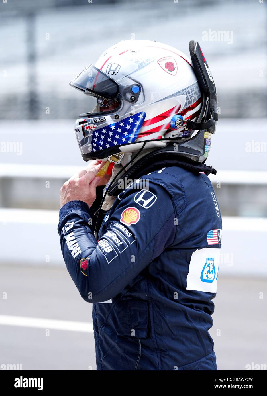INDIANAPOLIS, IN - MAY 13: IndyCar driver Marco Andretti puts on his helmet during practice for ...