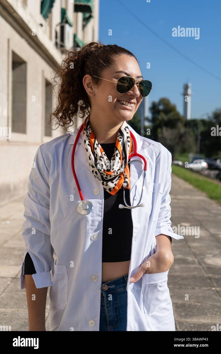 Female medical professional wearing sunglasses and a fashionable scarf ...
