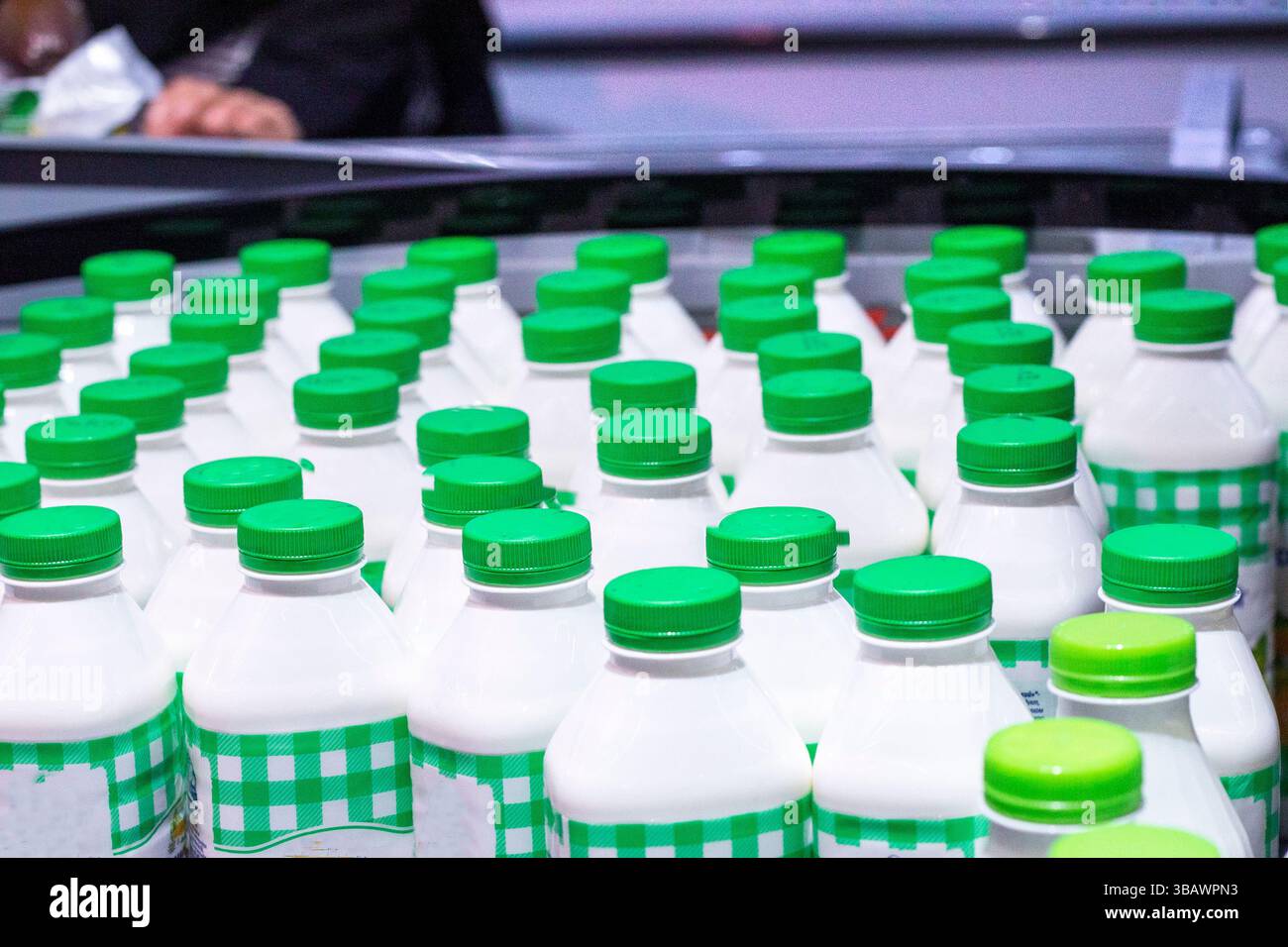 organic dairy products packed in plastic containers in the supermarket ...