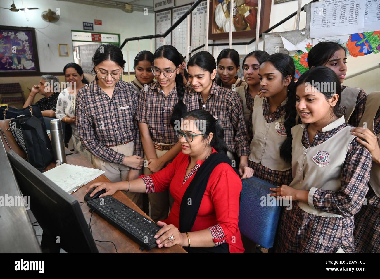 India. 13th May, 2025. GURUGRAM, INDIA - MAY 13: Students checking their result in computer ...