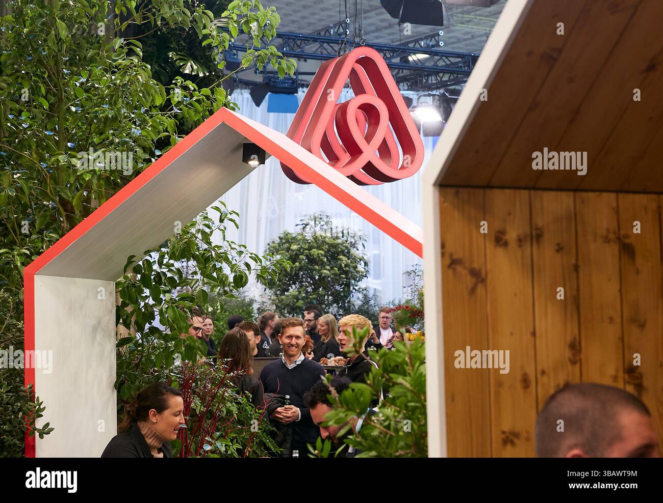04.03.2025, Germany, Berlin, Berlin - The Airbnb stand at ITB 2025 ...