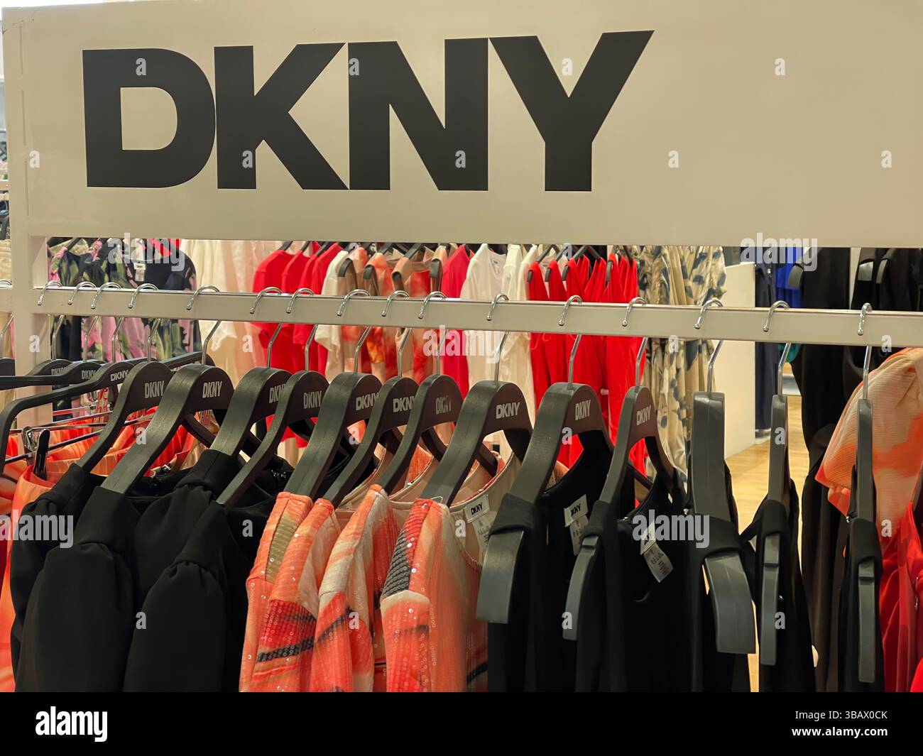 DKNY clothing rack inside Spanish department store Stock Photo - Alamy