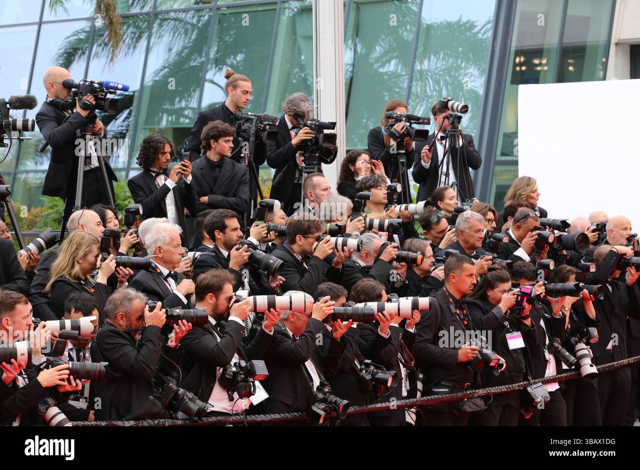 Cannes, France, 13th May, 2025. photographers working on the red carpet ...