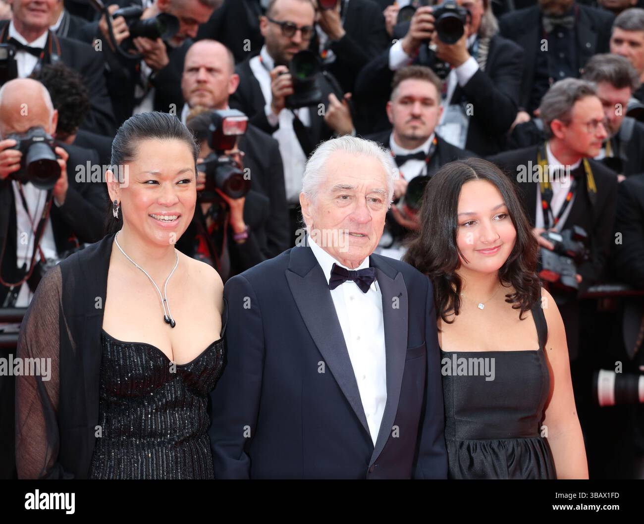 Cannes, France, 13th May, 2025. Robert De Niro and Tiffany Chen and and ...