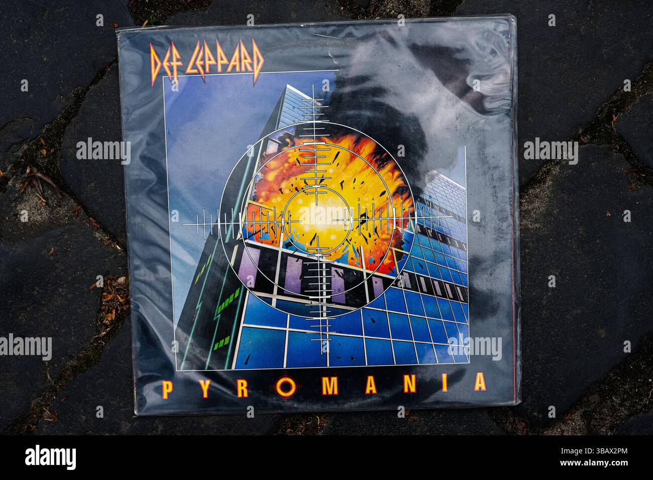 Lviv, Ukraine - May 13, 2025: Iconic Pyromania 1983 album cover of Def Leppard, highlighting ...