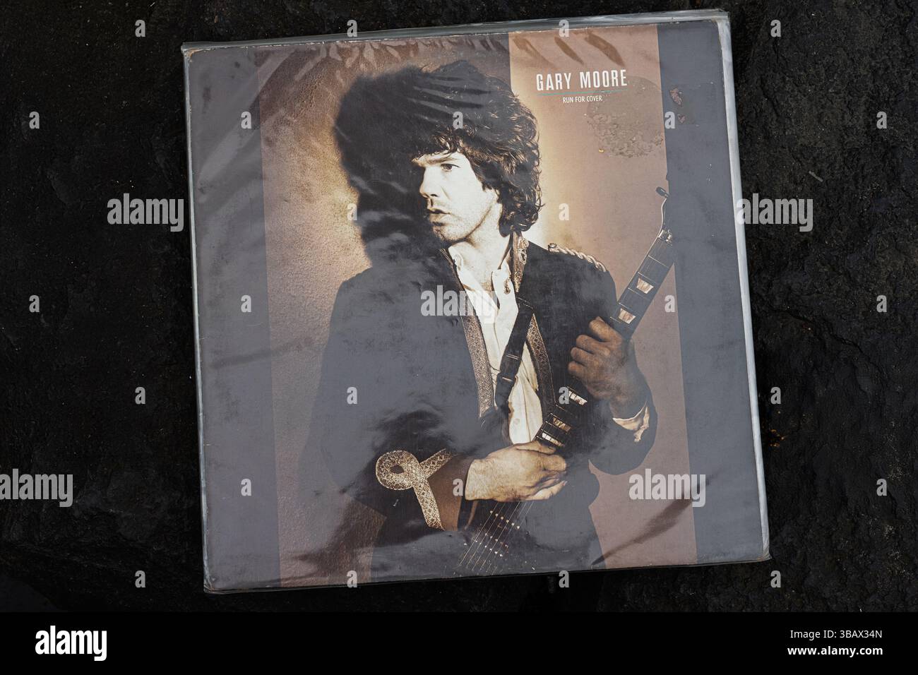 Lviv, Ukraine - May 13, 2025: Vinyl album cover for Gary Moore Run for ...