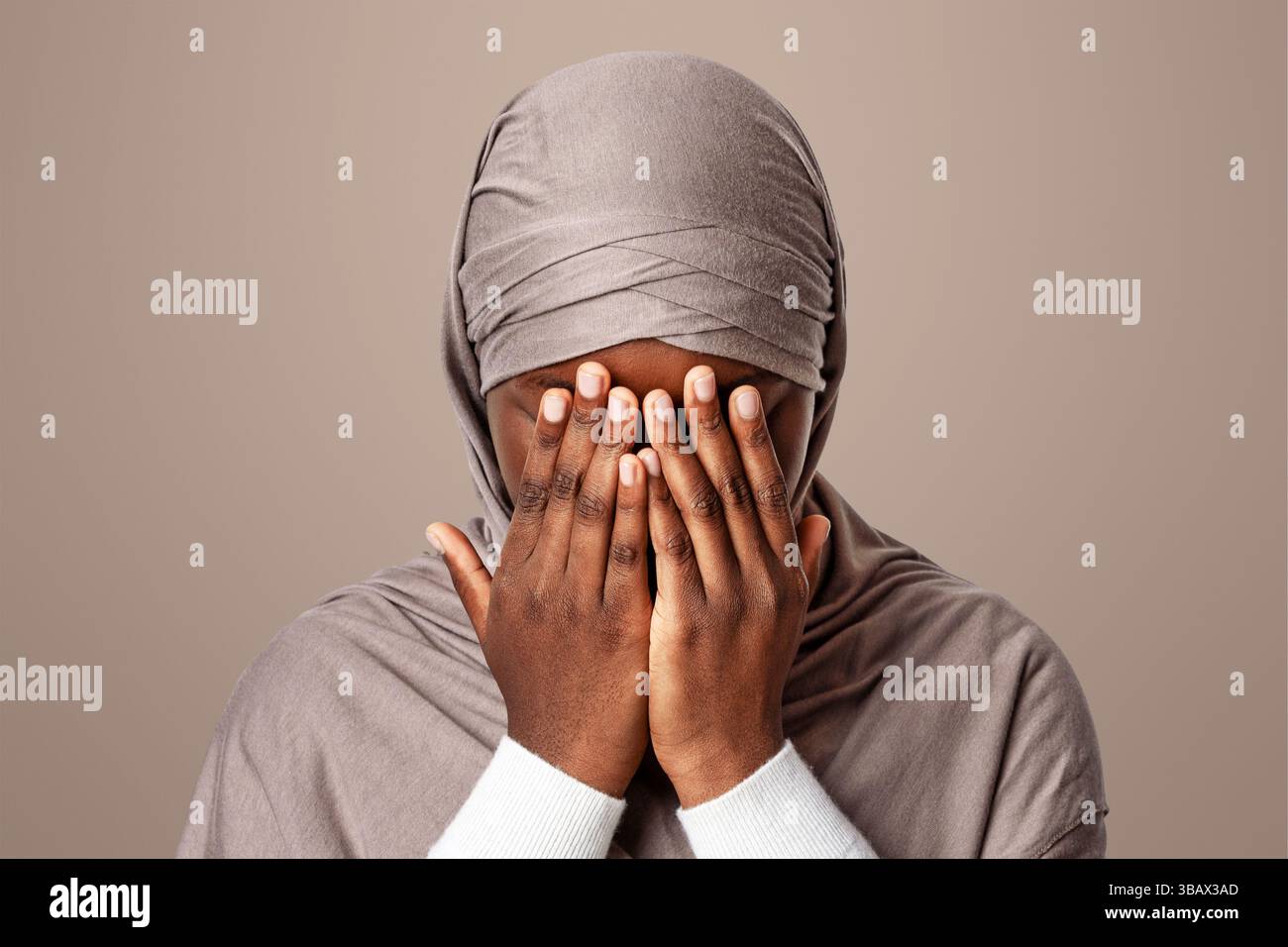 Muslim Discrimination. Scared black islamic woman in hijab covering ...