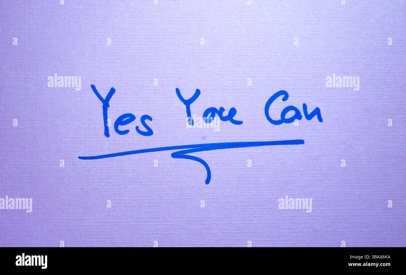 Yes you can. Yes you can. Pruple note with handwritten text in blue ...