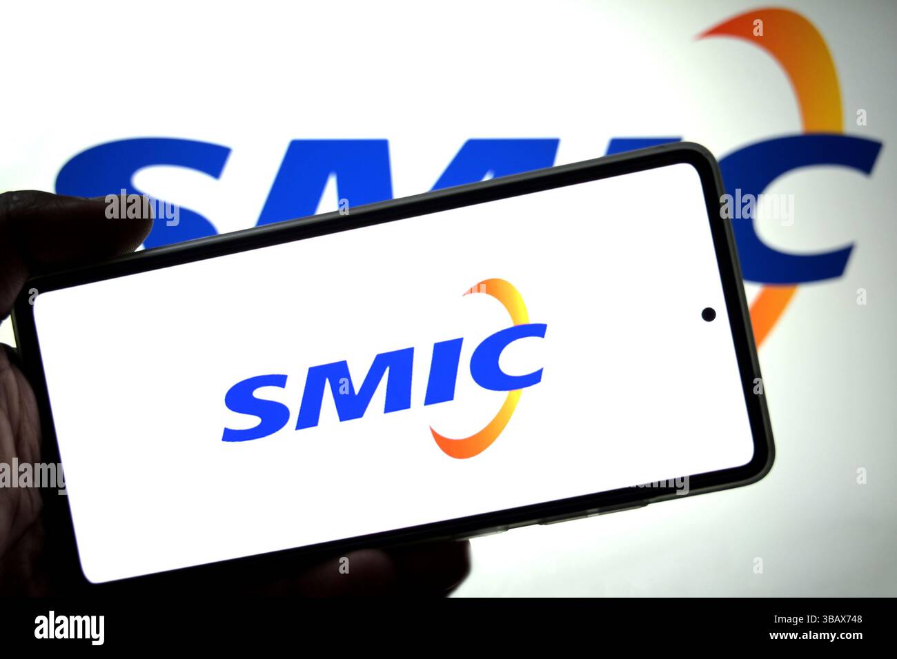 India. 13th May, 2025. In this photo illustration, a SMIC logo is seen ...