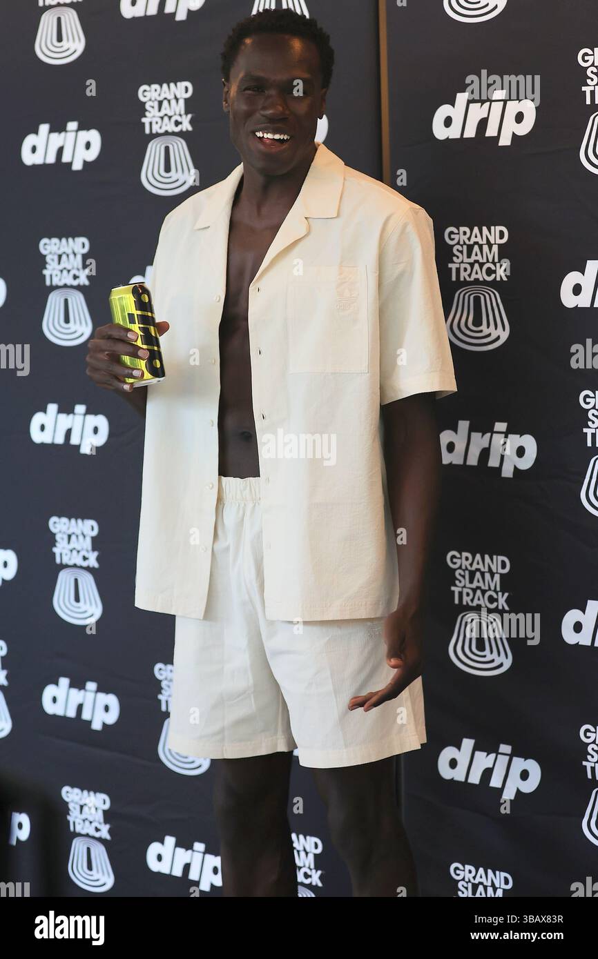 Marco Arop models fashion during the Grand Slam Track Miami Drip Check ...