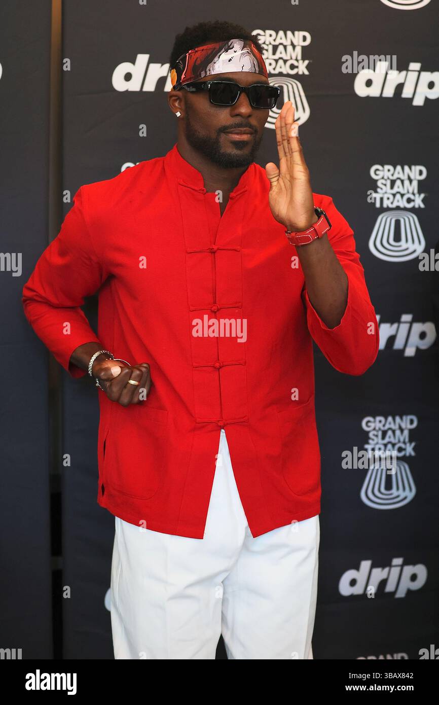 Kenny Bednarek models fashion during the Grand Slam Track Miami Drip ...