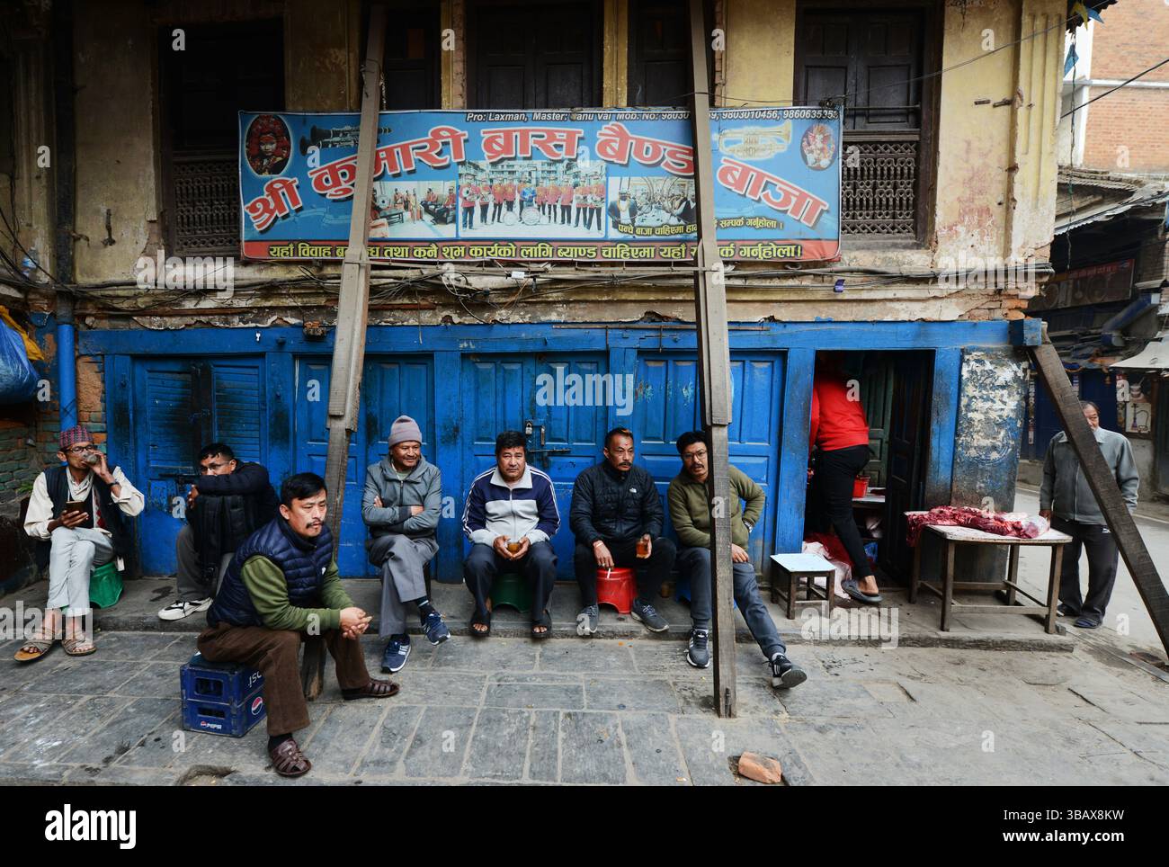 Nepali men drinking their morning tea at a small tea shop in central ...