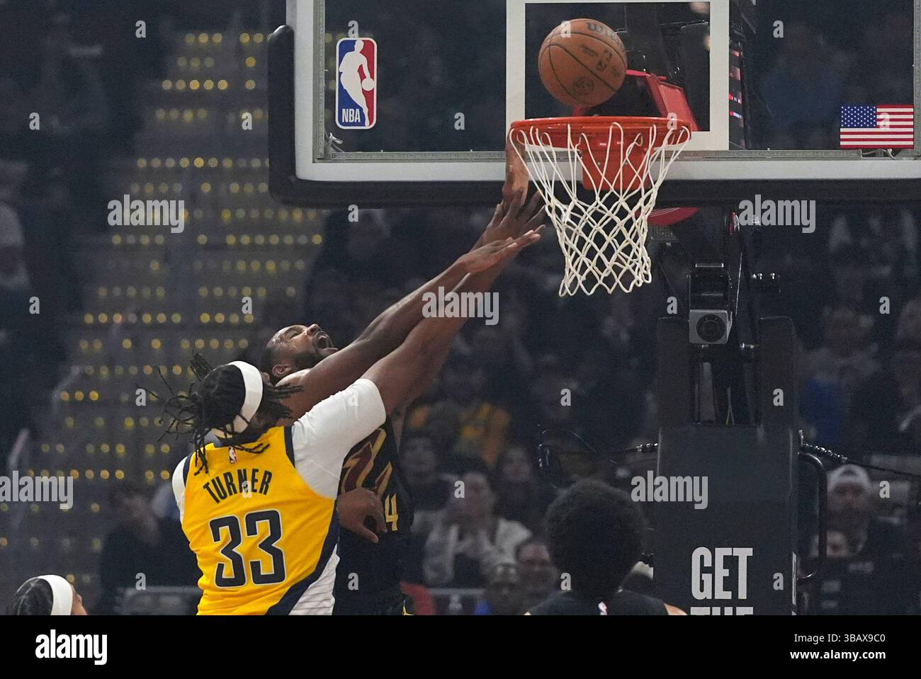Indiana Pacers center Myles Turner, left, fouls Cleveland Cavaliers ...