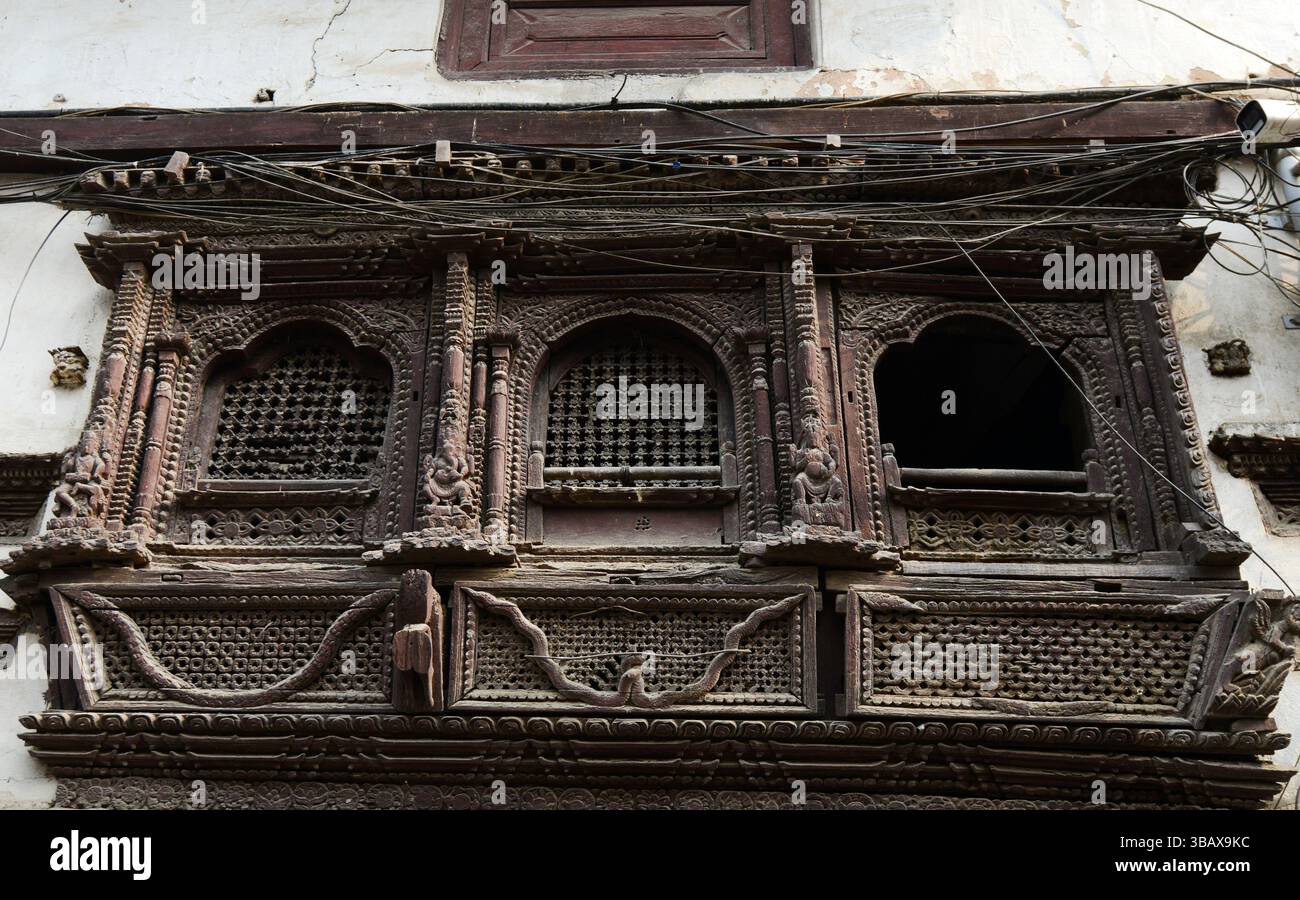 Beautiful Newari buildings at the street surrounding Durbar Square in ...