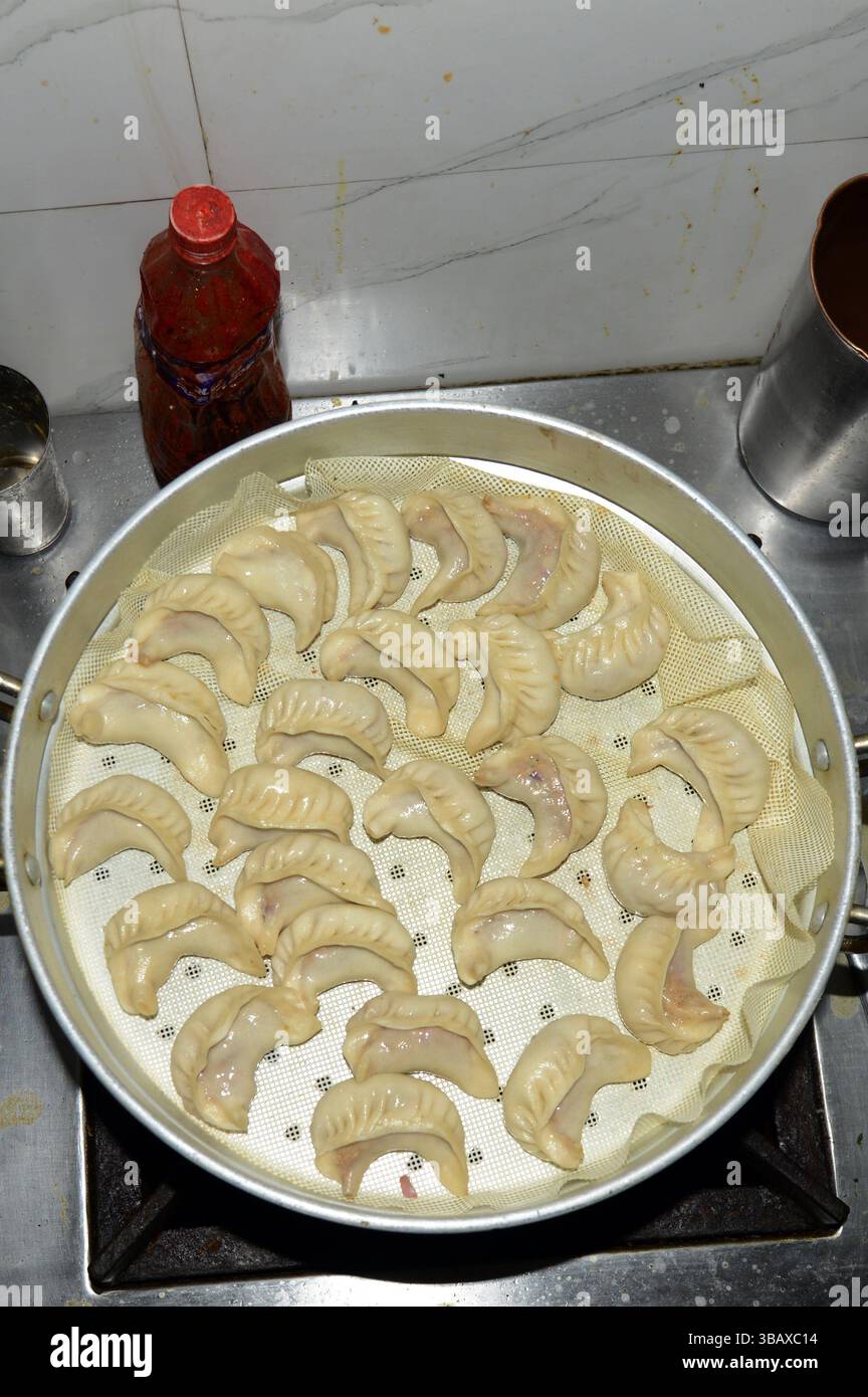 A pot of steamed Momos Stock Photo - Alamy