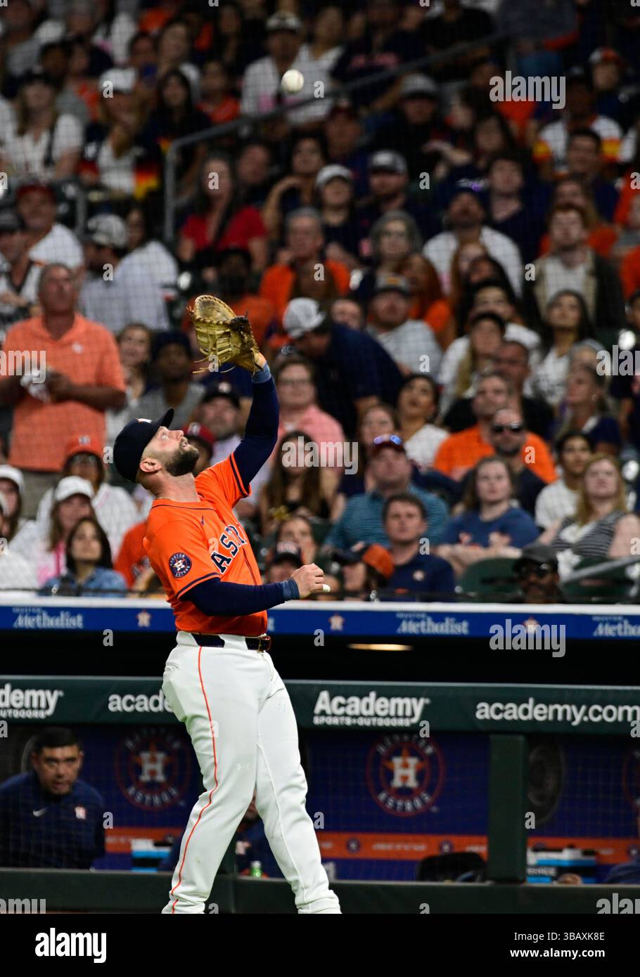 Houston Astros first baseman Christian Walker (8) catches a pop-up in ...