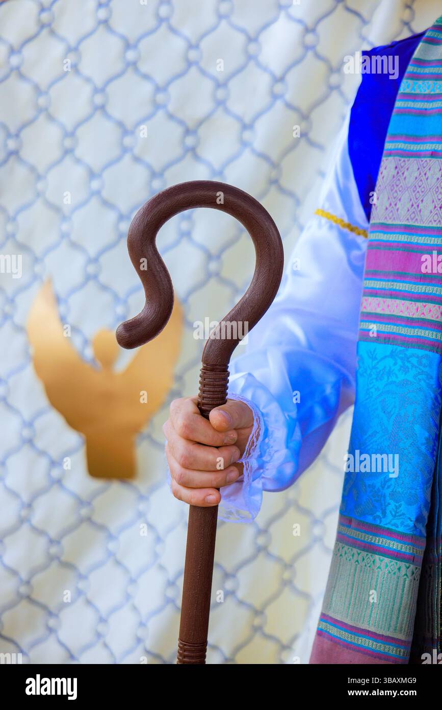 Jewish high priest dressed in ceremonial clothing holds staff ...