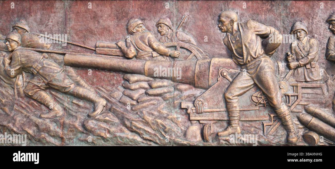 Corporal Seyit, carrying an artillery shell. In the long, bronze frieze ...